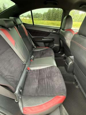 Black Subaru Impreza WRX 2015 in Riga, with an engine capacity of 2.50 L and mileage of 150 thousand km for 22000 €, photo 10 on AUTOMOTO.COM.LV