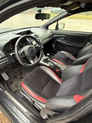 Black Subaru Impreza WRX 2015 in Riga, with an engine capacity of 2.50 L and mileage of 150 thousand km for 22000 €, photo 13 on AUTOMOTO.COM.LV