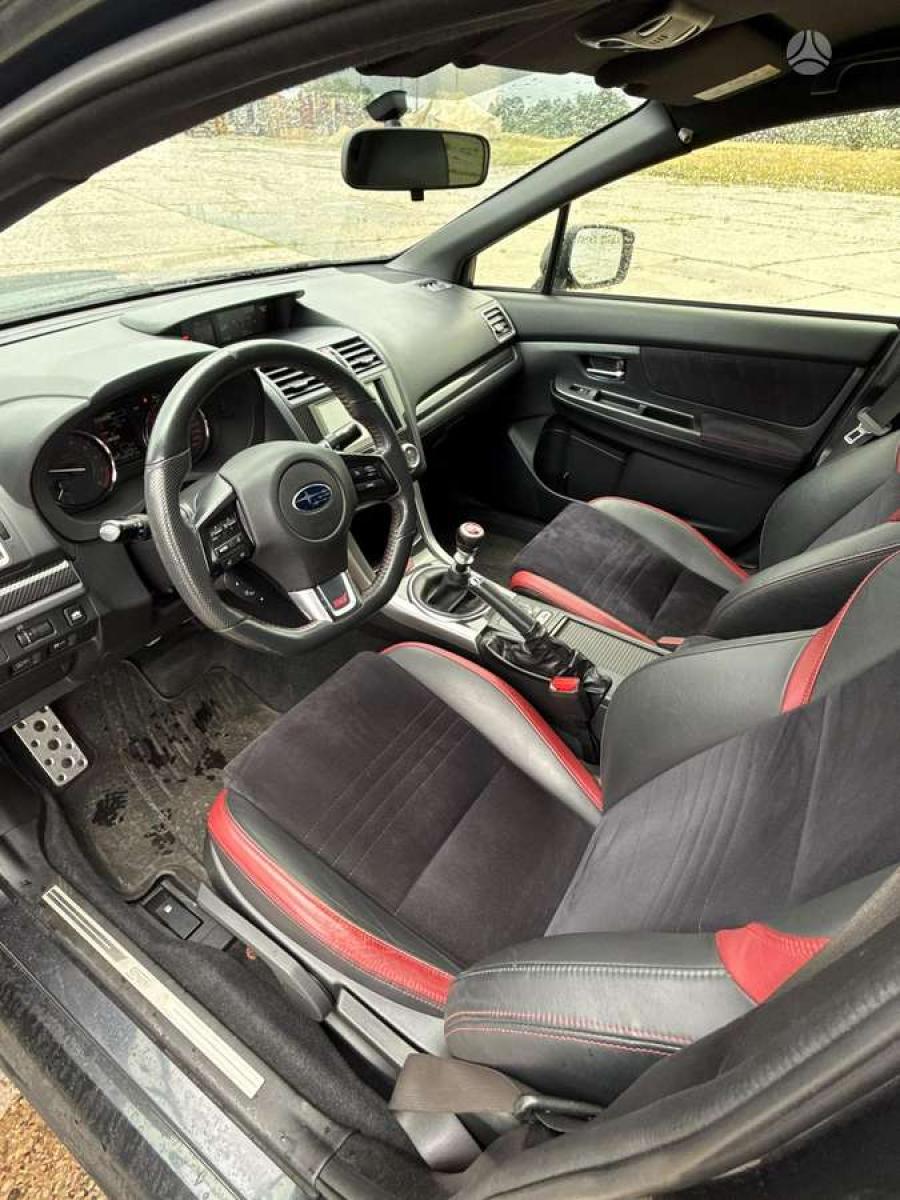 Black Subaru Impreza WRX 2015 in Riga, with an engine capacity of 2.50 L and mileage of 150 thousand km for 22000 €, photo 13 on AUTOMOTO.COM.LV