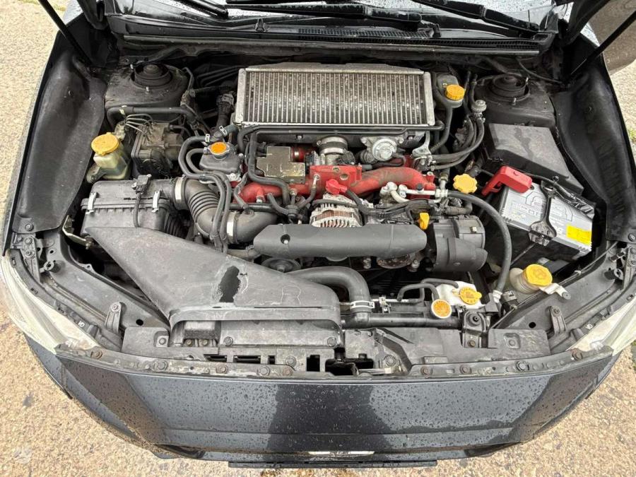 Black Subaru Impreza WRX 2015 in Riga, with an engine capacity of 2.50 L and mileage of 150 thousand km for 22000 €, photo 14 on AUTOMOTO.COM.LV
