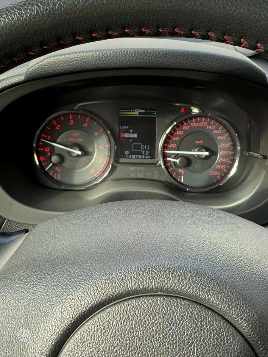 Black Subaru Impreza WRX 2015 in Riga, with an engine capacity of 2.50 L and mileage of 150 thousand km for 22000 €, photo 15 on AUTOMOTO.COM.LV