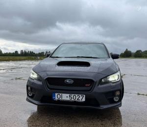 Black Subaru Impreza WRX 2015 in Riga, with an engine capacity of 2.50 L and mileage of 150 thousand km for 22000 €, photo 17 on AUTOMOTO.COM.LV