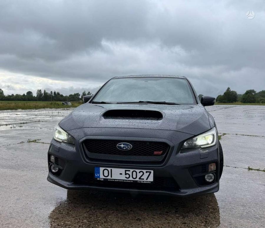 Black Subaru Impreza WRX 2015 in Riga, with an engine capacity of 2.50 L and mileage of 150 thousand km for 22000 €, photo 17 on AUTOMOTO.COM.LV