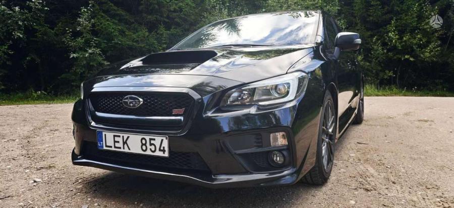 Black Subaru Impreza WRX 2015 in Vilnius, with an engine capacity of 2.00 L and mileage of 116 thousand km for 13800 €, photo 1 on AUTOMOTO.COM.LV