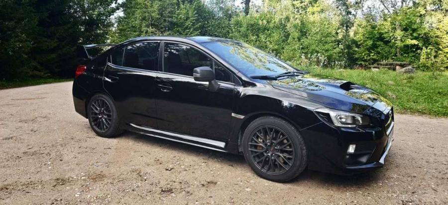 Black Subaru Impreza WRX 2015 in Vilnius, with an engine capacity of 2.00 L and mileage of 116 thousand km for 13800 €, photo 3 on AUTOMOTO.COM.LV