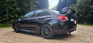 Black Subaru Impreza WRX 2015 in Vilnius, with an engine capacity of 2.00 L and mileage of 116 thousand km for 13800 €, photo 7 on AUTOMOTO.COM.LV