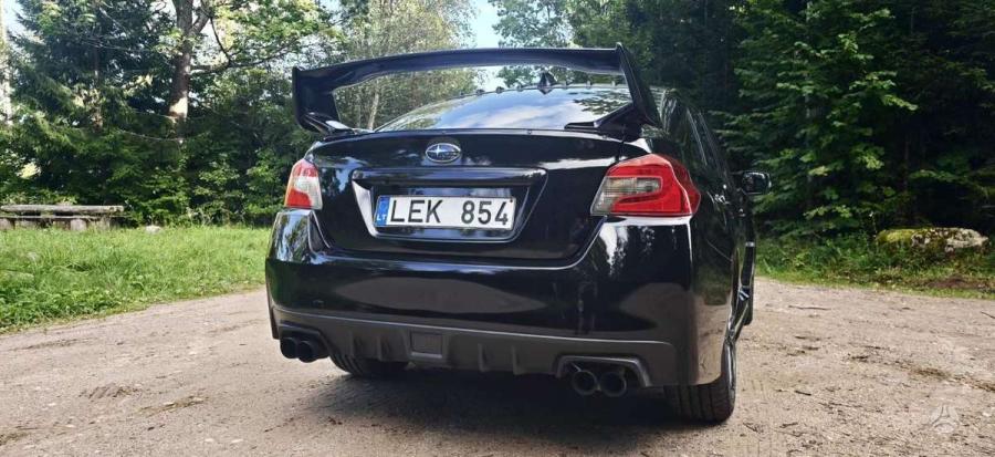 Black Subaru Impreza WRX 2015 in Vilnius, with an engine capacity of 2.00 L and mileage of 116 thousand km for 13800 €, photo 8 on AUTOMOTO.COM.LV