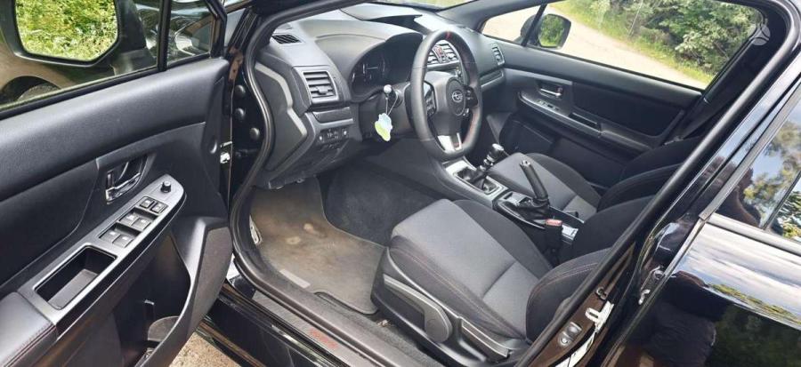 Black Subaru Impreza WRX 2015 in Vilnius, with an engine capacity of 2.00 L and mileage of 116 thousand km for 13800 €, photo 9 on AUTOMOTO.COM.LV