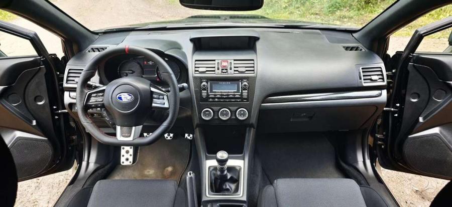 Black Subaru Impreza WRX 2015 in Vilnius, with an engine capacity of 2.00 L and mileage of 116 thousand km for 13800 €, photo 10 on AUTOMOTO.COM.LV