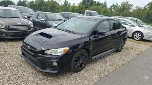 Black Subaru Impreza WRX 2018 in Kaunas, with an engine capacity of 2.00 L and mileage of 195 thousand km for 13900 €, photo 6 on AUTOMOTO.COM.LV