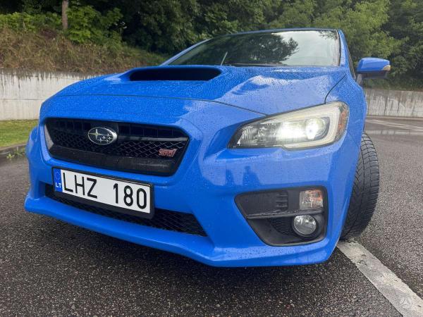 Blue Subaru Impreza WRX 2015 in Vilnius, with an engine capacity of 2.46 L and mileage of 132 thousand km for 17000 €, photo 2 on AUTOMOTO.COM.LV
