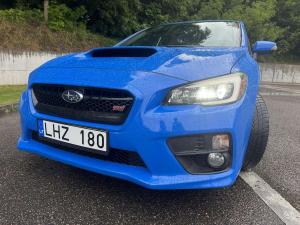 Blue Subaru Impreza WRX 2015 in Vilnius, with an engine capacity of 2.46 L and mileage of 132 thousand km for 17000 €, photo 3 on AUTOMOTO.COM.LV