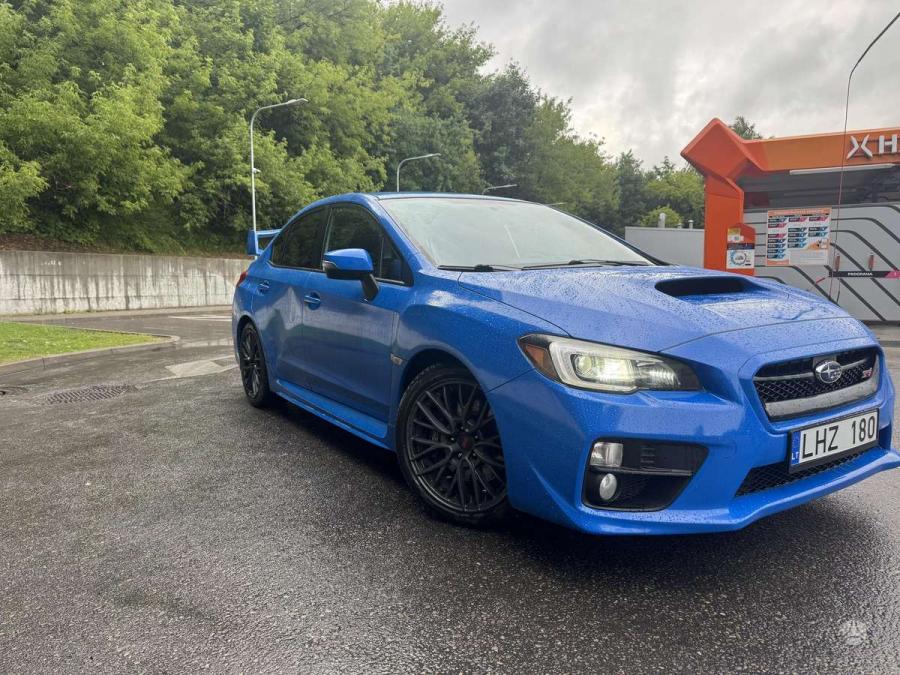 Blue Subaru Impreza WRX 2015 in Vilnius, with an engine capacity of 2.46 L and mileage of 132 thousand km for 17000 €, photo 5 on AUTOMOTO.COM.LV