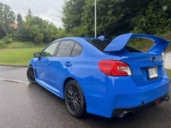 Blue Subaru Impreza WRX 2015 in Vilnius, with an engine capacity of 2.46 L and mileage of 132 thousand km for 17000 €, photo 5 on AUTOMOTO.COM.LV
