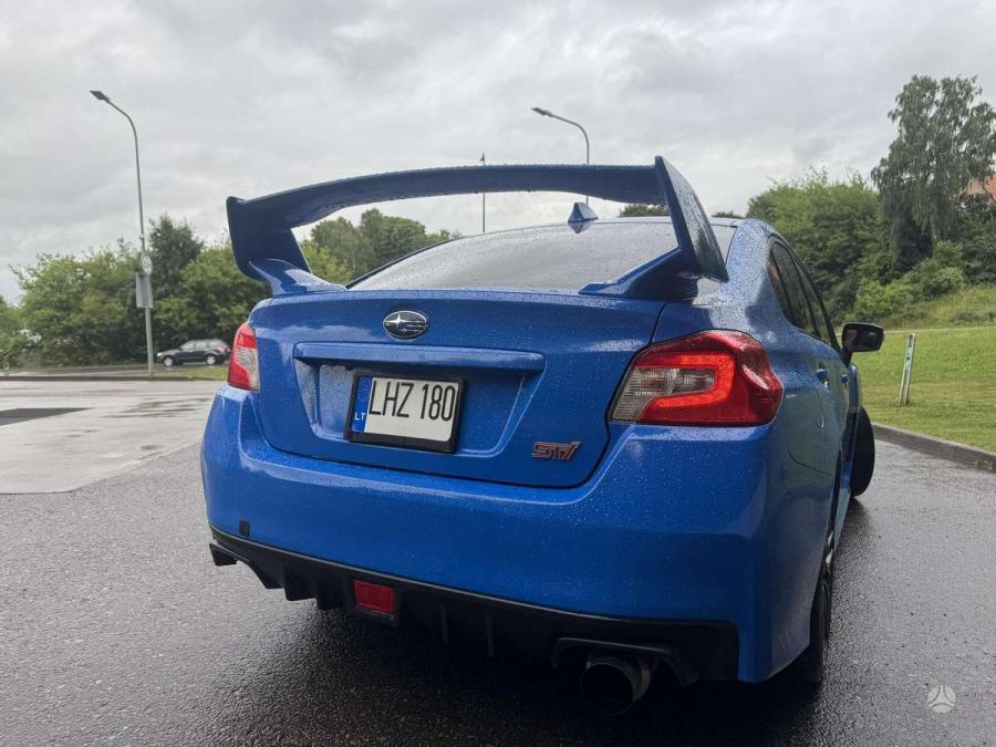 Blue Subaru Impreza WRX 2015 in Vilnius, with an engine capacity of 2.46 L and mileage of 132 thousand km for 17000 €, photo 7 on AUTOMOTO.COM.LV