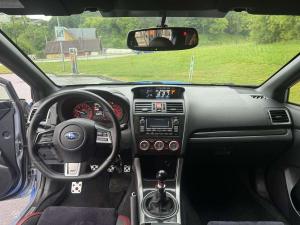 Blue Subaru Impreza WRX 2015 in Vilnius, with an engine capacity of 2.46 L and mileage of 132 thousand km for 17000 €, photo 11 on AUTOMOTO.COM.LV