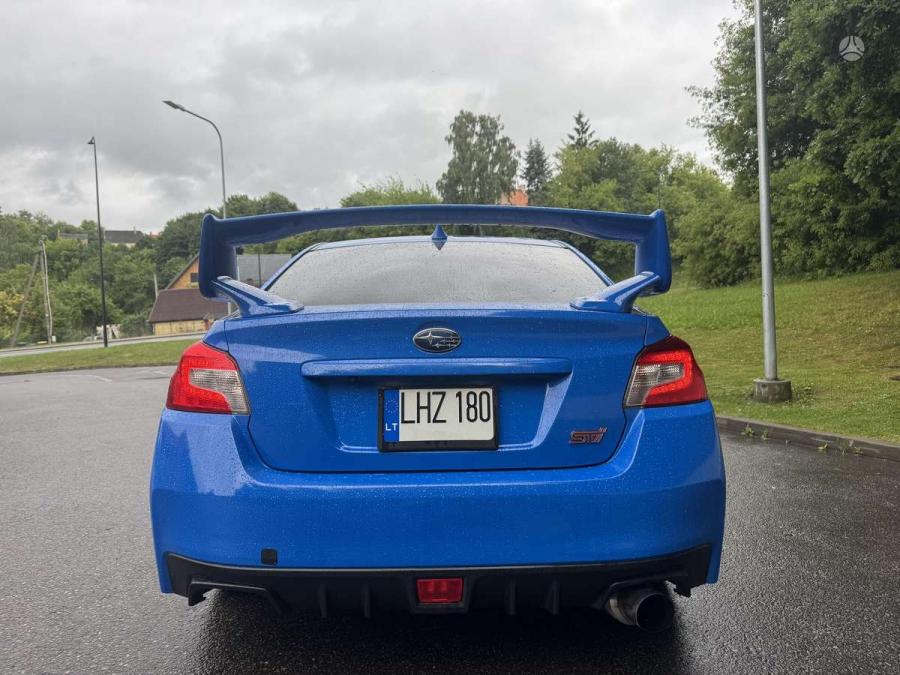 Blue Subaru Impreza WRX 2015 in Vilnius, with an engine capacity of 2.46 L and mileage of 132 thousand km for 17000 €, photo 18 on AUTOMOTO.COM.LV
