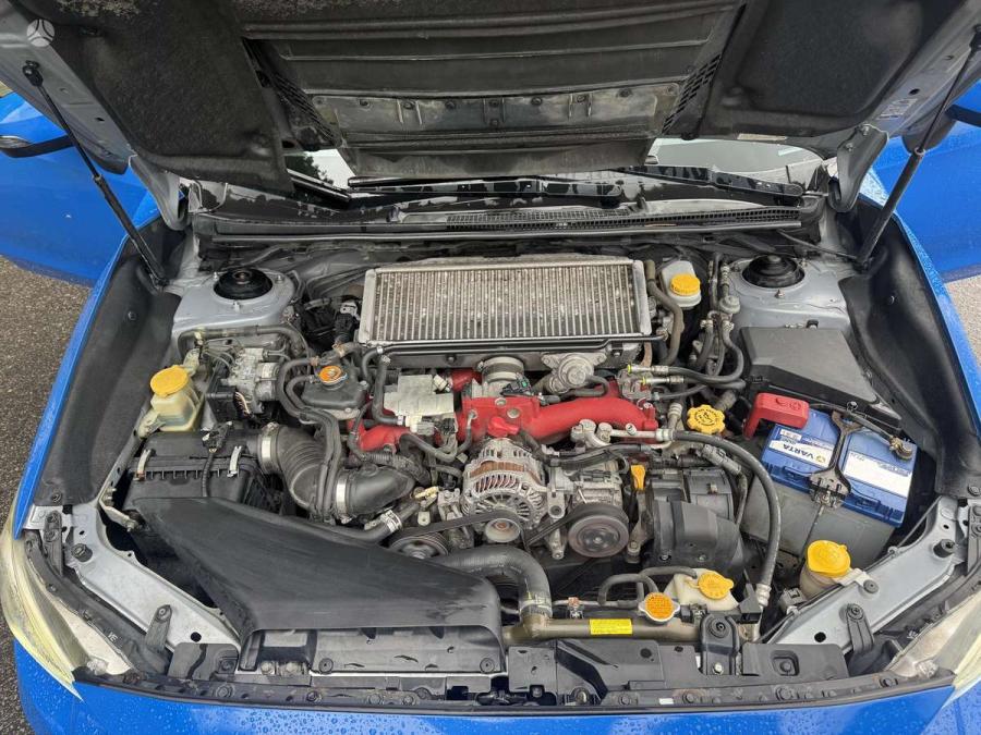Blue Subaru Impreza WRX 2015 in Vilnius, with an engine capacity of 2.46 L and mileage of 132 thousand km for 17000 €, photo 19 on AUTOMOTO.COM.LV