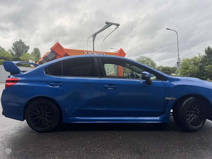 Blue Subaru Impreza WRX 2015 in Vilnius, with an engine capacity of 2.46 L and mileage of 132 thousand km for 17000 €, photo 23 on AUTOMOTO.COM.LV
