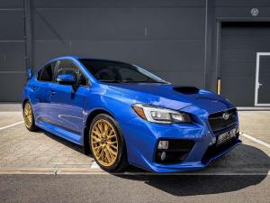 Zils Subaru Impreza WRX 2015 Rīga, ar dzinēja tilpumu 2.46 L un nobraukumu 124 tūkst. km par 23800 €, foto  vietnē AUTOMOTO.COM.LV