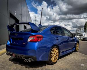 Zils Subaru Impreza WRX 2015 Rīga, ar dzinēja tilpumu 2.46 L un nobraukumu 124 tūkst. km par 23800 €, foto 4 vietnē AUTOMOTO.COM.LV