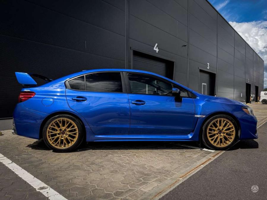Zils Subaru Impreza WRX 2015 Rīga, ar dzinēja tilpumu 2.46 L un nobraukumu 124 tūkst. km par 23800 €, foto 7 vietnē AUTOMOTO.COM.LV