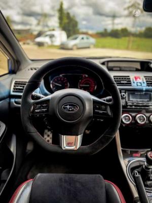 Zils Subaru Impreza WRX 2015 Rīga, ar dzinēja tilpumu 2.46 L un nobraukumu 124 tūkst. km par 23800 €, foto 8 vietnē AUTOMOTO.COM.LV