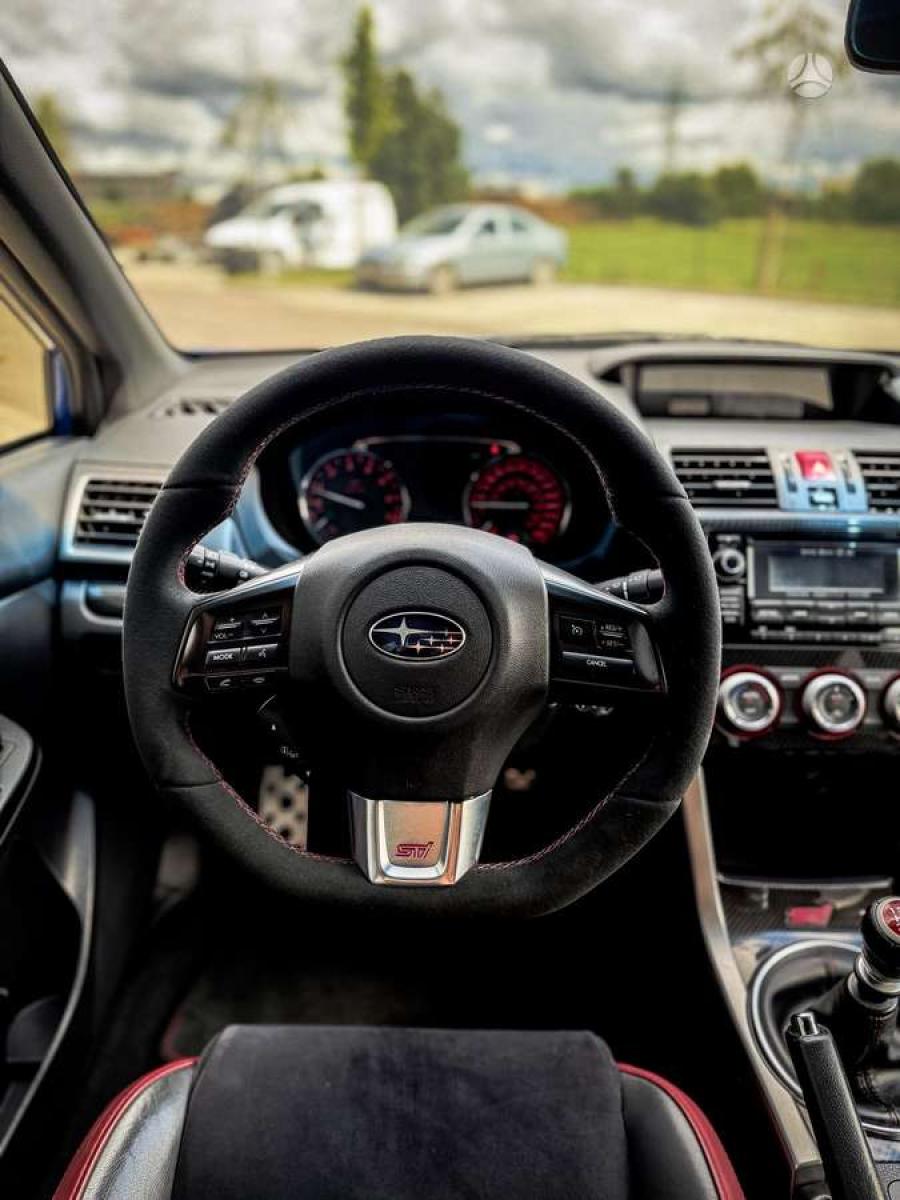 Zils Subaru Impreza WRX 2015 Rīga, ar dzinēja tilpumu 2.46 L un nobraukumu 124 tūkst. km par 23800 €, foto 8 vietnē AUTOMOTO.COM.LV
