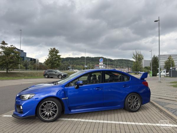 Blue Subaru Impreza WRX 2016 in Vilnius, with an engine capacity of 2.50 L and mileage of 94 thousand km for 23990 €, photo 4 on AUTOMOTO.COM.LV