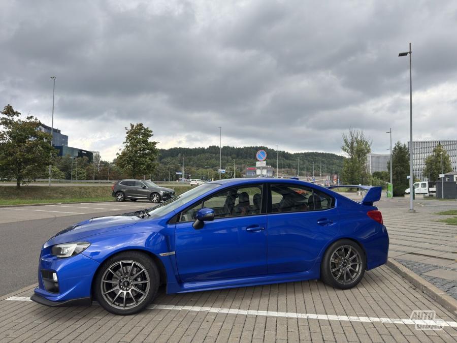 Blue Subaru Impreza WRX 2016 in Vilnius, with an engine capacity of 2.50 L and mileage of 94 thousand km for 23990 €, photo 4 on AUTOMOTO.COM.LV