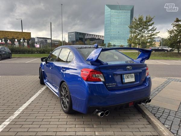 Blue Subaru Impreza WRX 2016 in Vilnius, with an engine capacity of 2.50 L and mileage of 94 thousand km for 23990 €, photo 5 on AUTOMOTO.COM.LV