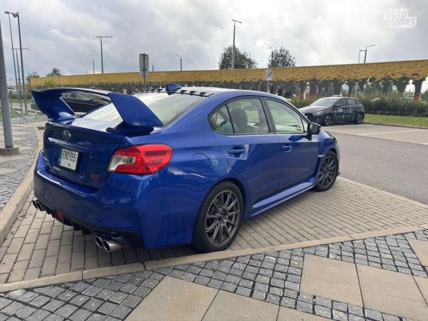 Blue Subaru Impreza WRX 2016 in Vilnius, with an engine capacity of 2.50 L and mileage of 94 thousand km for 23990 €, photo 6 on AUTOMOTO.COM.LV
