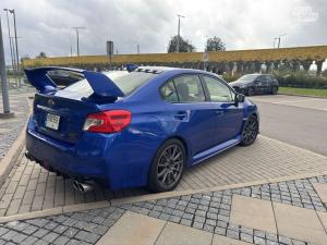 Blue Subaru Impreza WRX 2016 in Vilnius, with an engine capacity of 2.50 L and mileage of 94 thousand km for 23990 €, photo 6 on AUTOMOTO.COM.LV