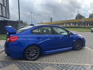 Blue Subaru Impreza WRX 2016 in Vilnius, with an engine capacity of 2.50 L and mileage of 94 thousand km for 23990 €, photo 7 on AUTOMOTO.COM.LV