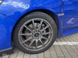 Blue Subaru Impreza WRX 2016 in Vilnius, with an engine capacity of 2.50 L and mileage of 94 thousand km for 23990 €, photo 8 on AUTOMOTO.COM.LV