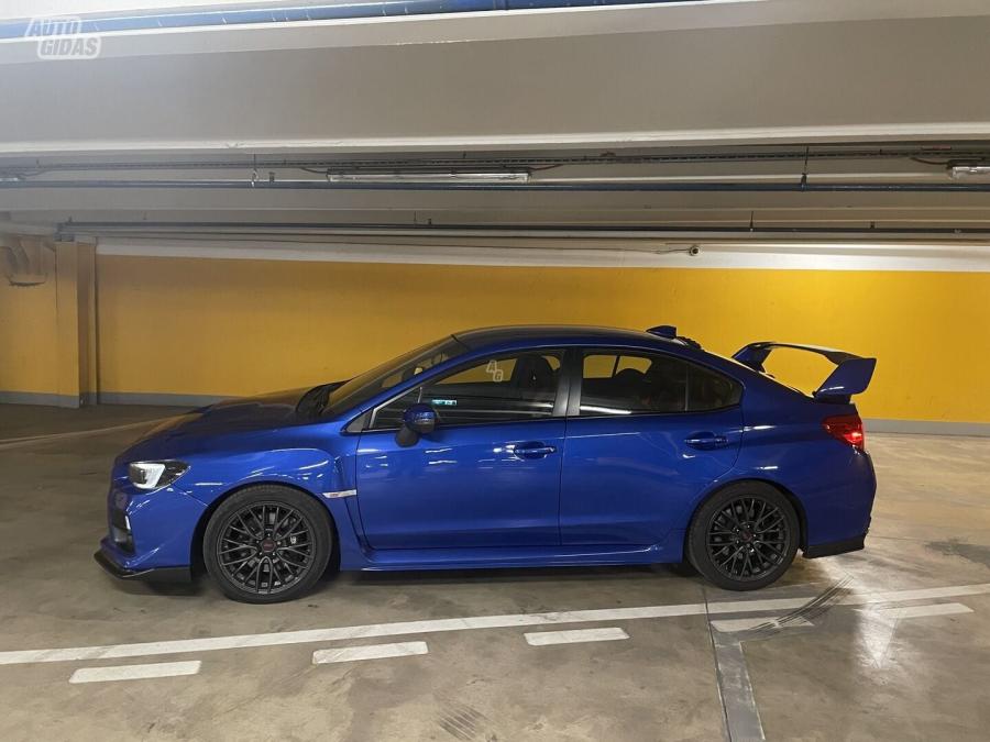 Blue Subaru Impreza WRX 2016 in Vilnius, with an engine capacity of 2.50 L and mileage of 94 thousand km for 23990 €, photo 11 on AUTOMOTO.COM.LV