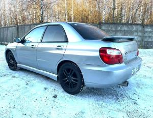 Grey Subaru Impreza WRX 2005 in Panevezys, with an engine capacity of 1.99 L and mileage of 195 thousand km for 7500 €, photo 6 on AUTOMOTO.COM.LV
