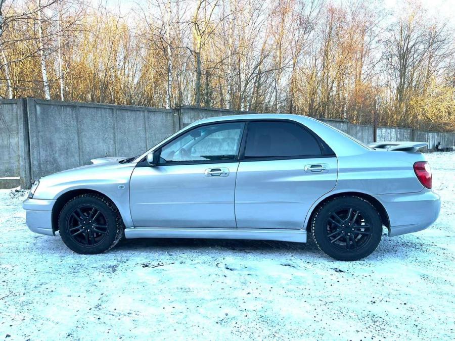 Grey Subaru Impreza WRX 2005 in Panevezys, with an engine capacity of 1.99 L and mileage of 195 thousand km for 7500 €, photo 7 on AUTOMOTO.COM.LV