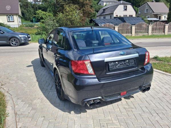 Grey Subaru Impreza WRX 2011 in Vilnius, with an engine capacity of 2.46 L and mileage of 144 thousand km for 13400 €, photo 4 on AUTOMOTO.COM.LV