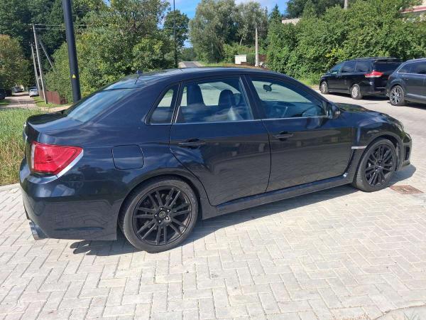 Grey Subaru Impreza WRX 2011 in Vilnius, with an engine capacity of 2.46 L and mileage of 144 thousand km for 13400 €, photo 5 on AUTOMOTO.COM.LV