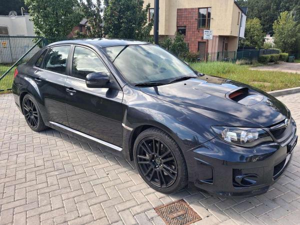 Grey Subaru Impreza WRX 2011 in Vilnius, with an engine capacity of 2.46 L and mileage of 144 thousand km for 13400 €, photo 6 on AUTOMOTO.COM.LV