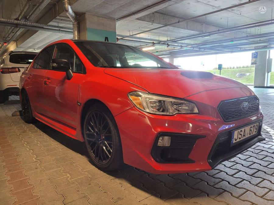 Red Subaru Impreza WRX 2018 in Vilnius, with an engine capacity of 2.00 L and mileage of 71 thousand km for 13999 €, photo 3 on AUTOMOTO.COM.LV