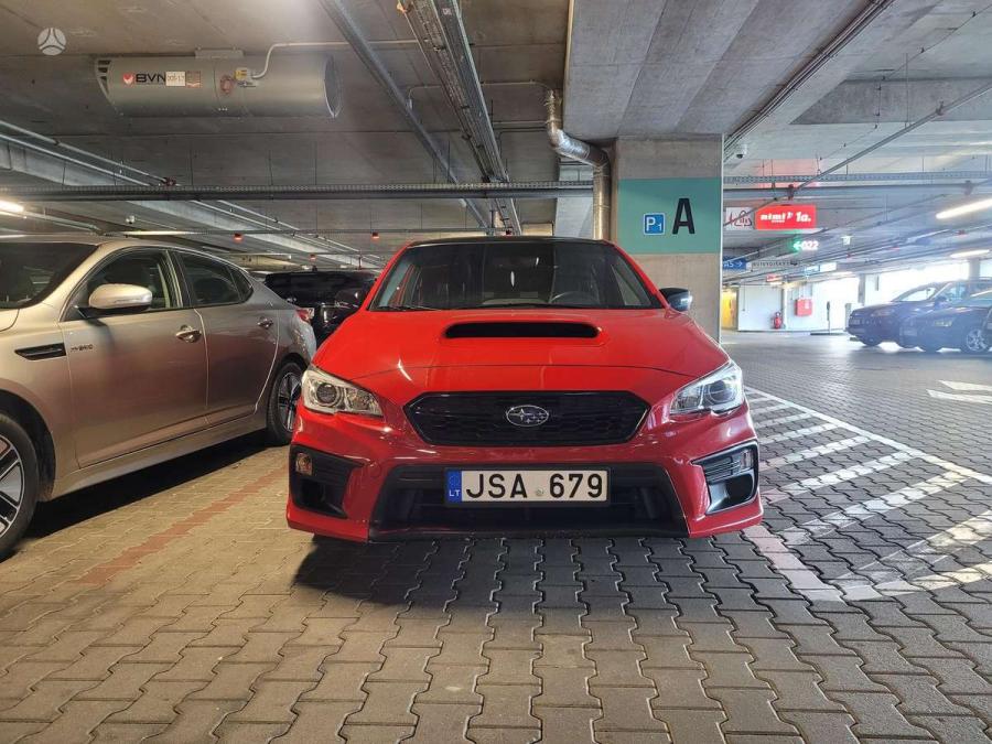 Red Subaru Impreza WRX 2018 in Vilnius, with an engine capacity of 2.00 L and mileage of 71 thousand km for 13999 €, photo 4 on AUTOMOTO.COM.LV