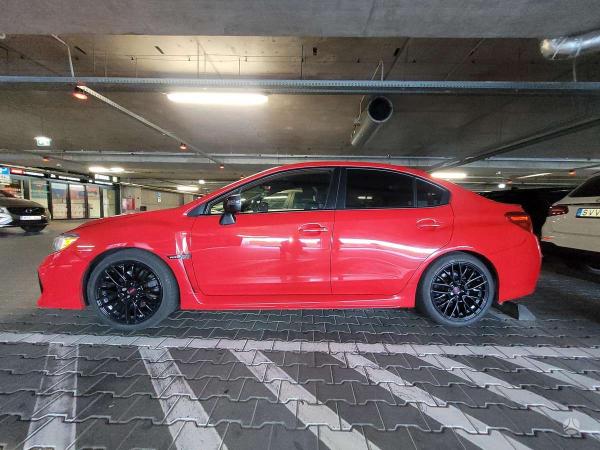 Red Subaru Impreza WRX 2018 in Vilnius, with an engine capacity of 2.00 L and mileage of 71 thousand km for 13999 €, photo 4 on AUTOMOTO.COM.LV