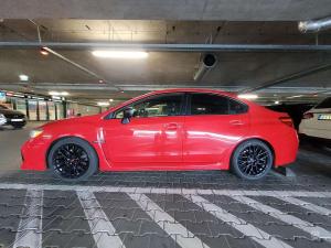 Red Subaru Impreza WRX 2018 in Vilnius, with an engine capacity of 2.00 L and mileage of 71 thousand km for 13999 €, photo 5 on AUTOMOTO.COM.LV