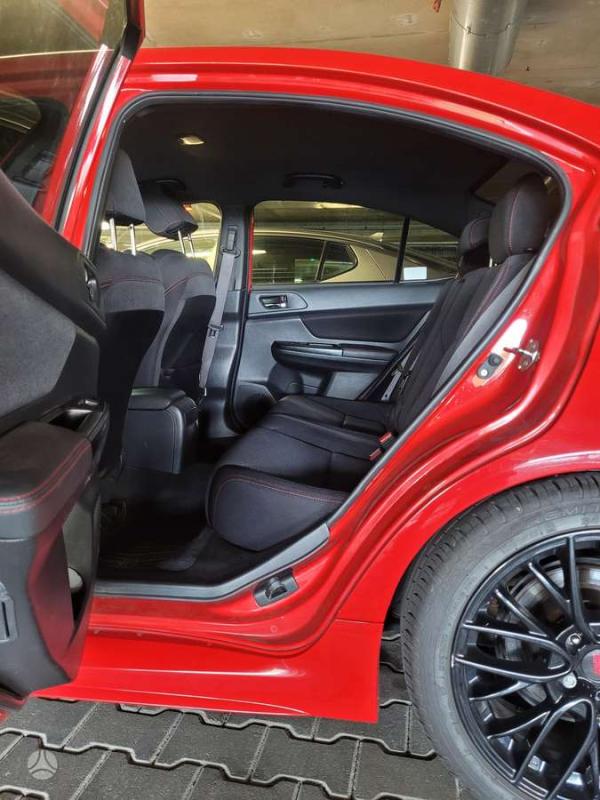 Red Subaru Impreza WRX 2018 in Vilnius, with an engine capacity of 2.00 L and mileage of 71 thousand km for 13999 €, photo 9 on AUTOMOTO.COM.LV