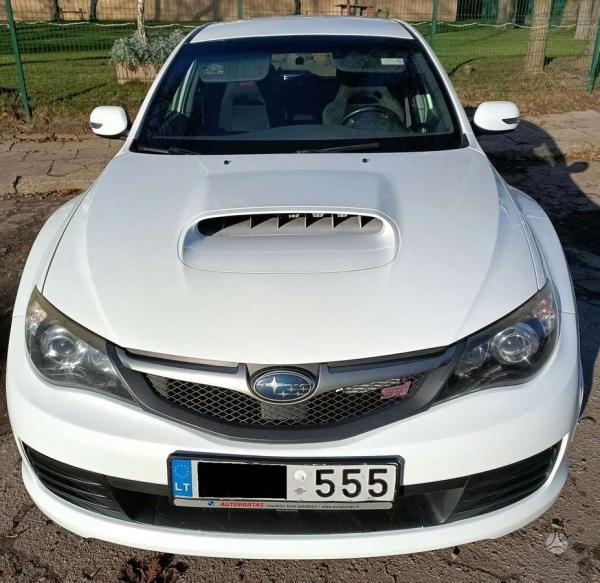 White Subaru Impreza WRX 2011 in Vilnius, with an engine capacity of 1.99 L and mileage of 125 thousand km for 14000 €, photo 2 on AUTOMOTO.COM.LV