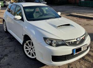 White Subaru Impreza WRX 2011 in Vilnius, with an engine capacity of 1.99 L and mileage of 125 thousand km for 14000 €, photo 3 on AUTOMOTO.COM.LV