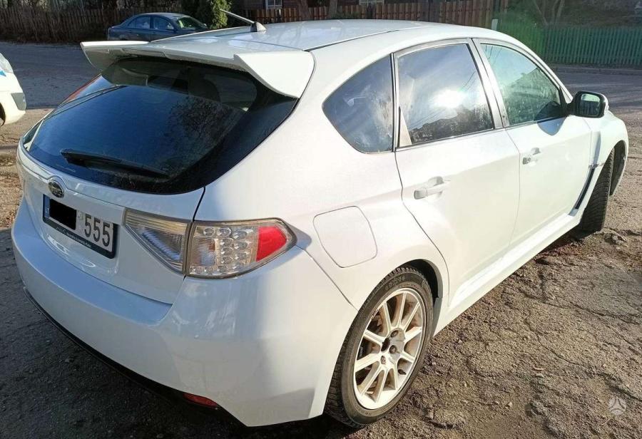 White Subaru Impreza WRX 2011 in Vilnius, with an engine capacity of 1.99 L and mileage of 125 thousand km for 14000 €, photo 4 on AUTOMOTO.COM.LV