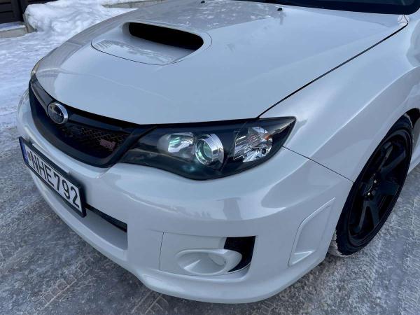 Белый Субару Impreza WRX 2011 в Вильнюс, объемом двигателя 2.46 л и пробегом 140 тыс. км за 7800 €, фото 2 на AUTOMOTO.COM.LV